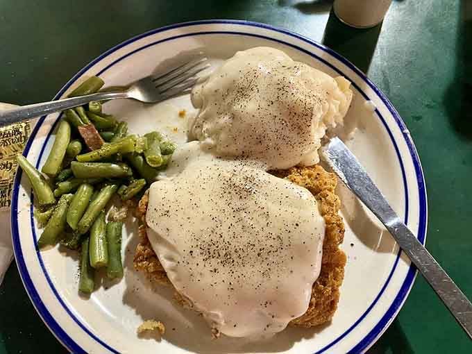 Country fried steak smothered in white gravy proves that some traditions exist because they're absolutely, undeniably perfect.