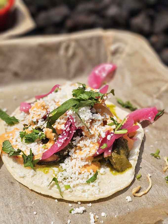 Roasted mushrooms piled high with queso fresco prove vegetarian tacos can steal the show from their meaty cousins.