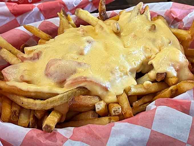 Cheese fries taken to their logical, glorious conclusion where calories don't count and happiness is measured in melted goodness.