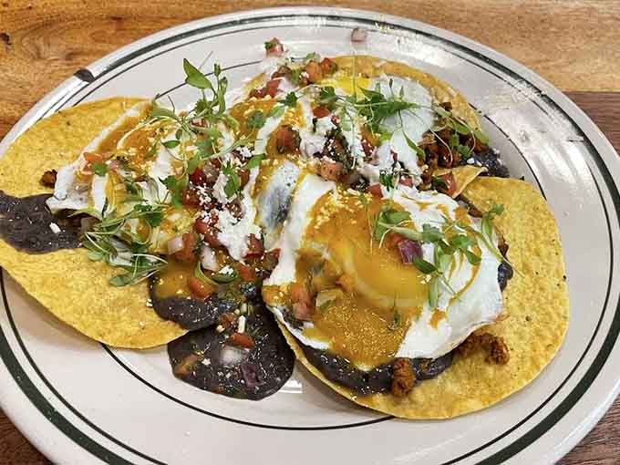 Huevos rancheros arrive looking like a fiesta decided to throw itself right there on your breakfast plate.