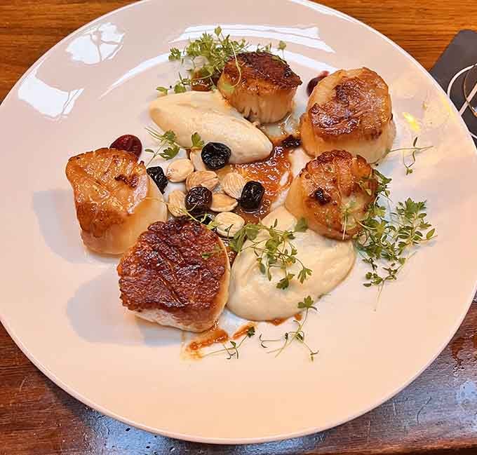 Seared scallops with a golden crust that could make a vegetarian seriously reconsider their life choices, just temporarily.