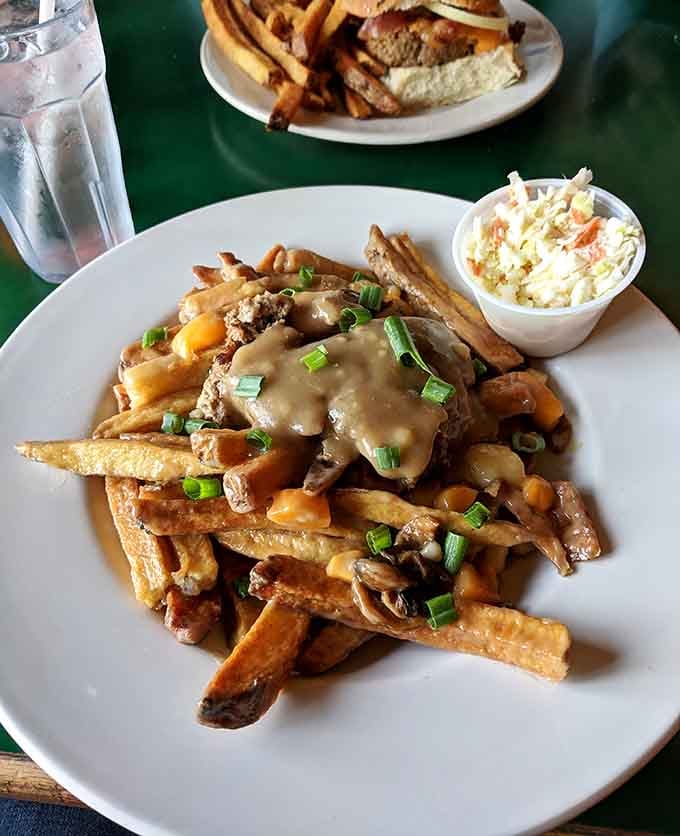Loaded poutine with mushrooms and gravy turns french fries into a full-contact sport you'll happily lose every time.