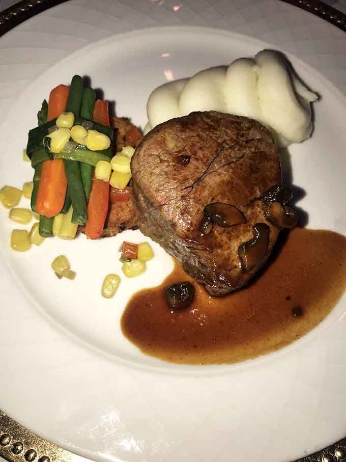 Filet mignon with vegetables so colorful they could double as a still life painting, delicious art.