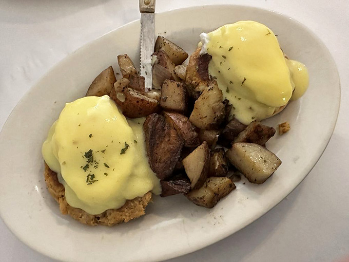 Crab cake Benedict with hollandaise that'll make you question every other breakfast you've ever eaten.