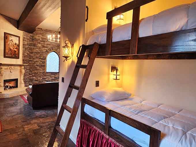 Bunk beds in a castle tower prove that childhood dreams and adult vacations can absolutely coexist in perfect harmony.