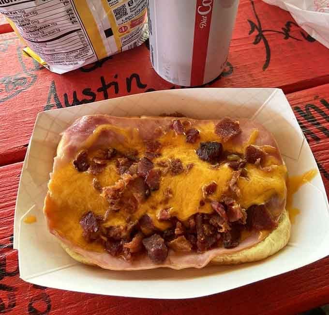 Bacon, ham, and cheddar cheese piled high on a hot dog&mdash;the Wally Mutt doesn't believe in holding back or counting calories.