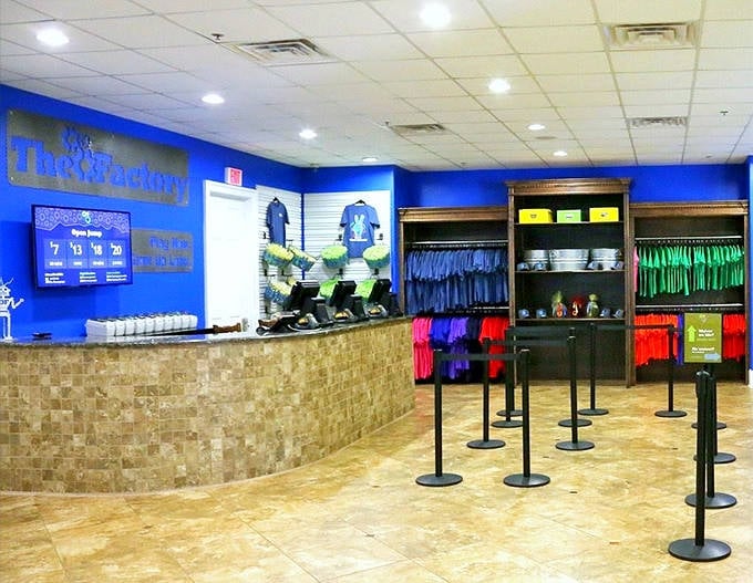 The check-in counter gleams with organized efficiency, ready to process your family's ticket to controlled chaos.