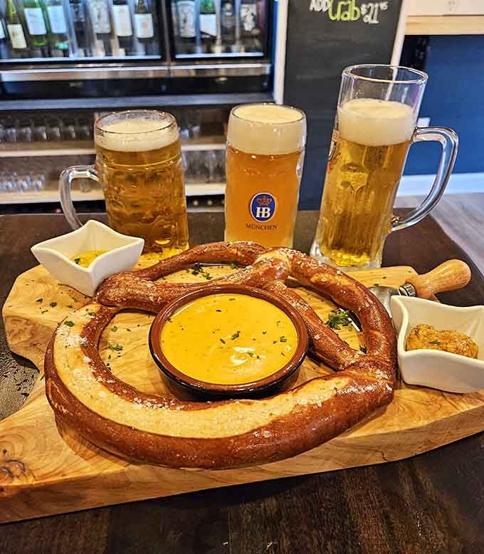 Beer cheese pretzels and German beer steins suggest someone here understands the universal language of carbs and happiness.