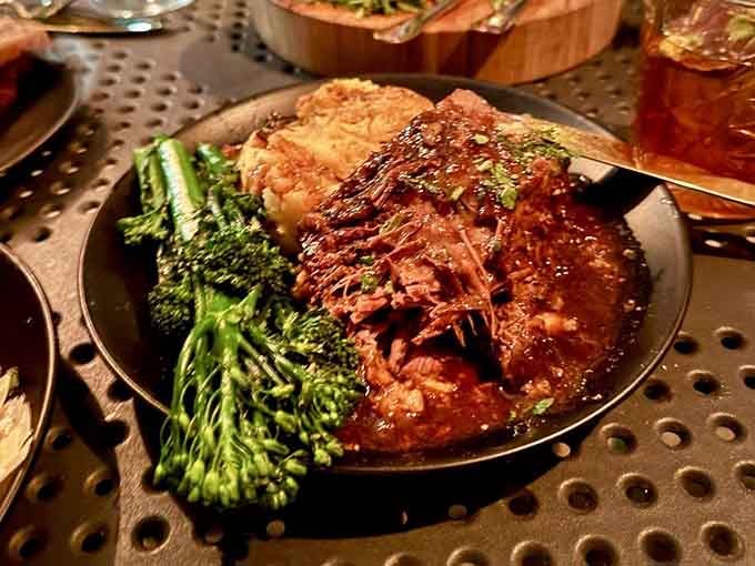 Short ribs so tender they practically fall apart at the mere suggestion of a fork, swimming in savory perfection.