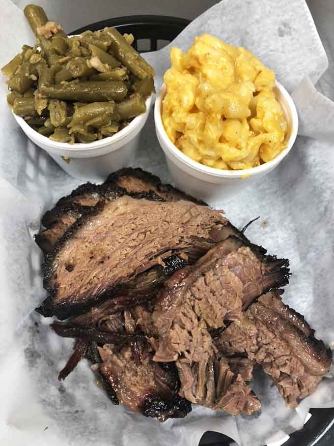 Brisket with a smoke ring that would make any pitmaster weep tears of joy and professional envy.