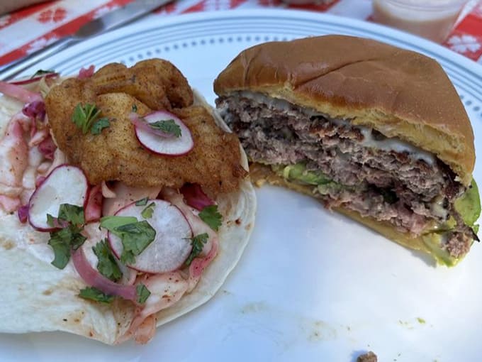 That cross-section reveals layers of flavor that would make any burger architect proud of their work.