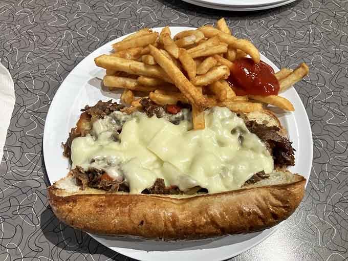 The Philly steak drowning in melted cheese proves that sometimes more is definitely more, gloriously so.