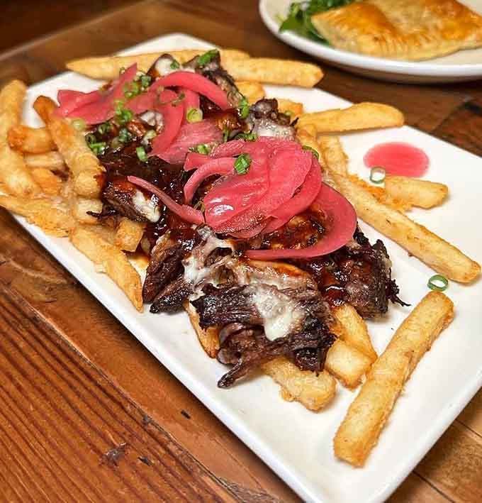 Short rib poutine that makes you question everything you thought you knew about elevated bar food done right.