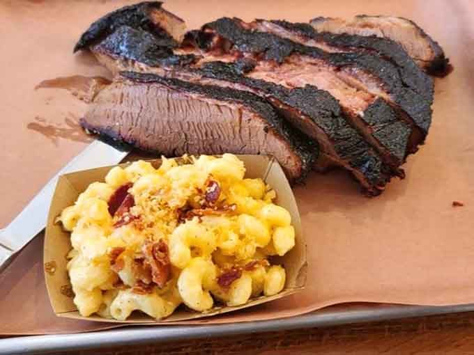 Brisket with a smoke ring that'll make you believe in miracles, served alongside creamy mac and cheese.