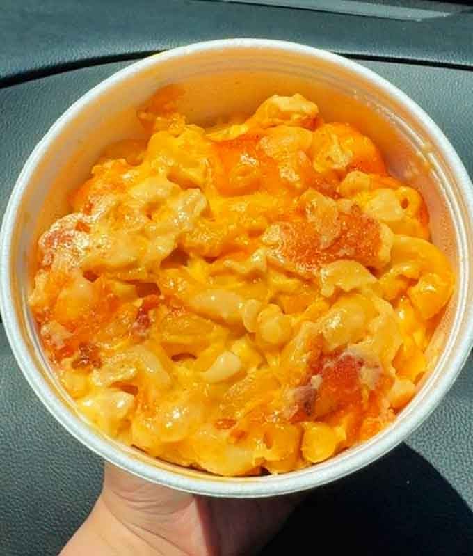 Mac and cheese so creamy and golden it practically glows, proving sides deserve as much attention as the main event.