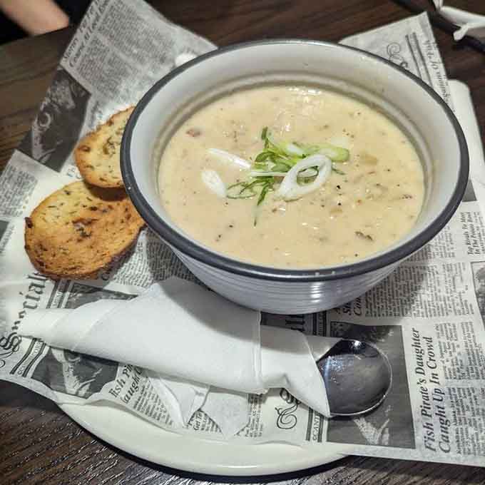 Creamy chowder topped with fresh scallions, served with toasted bread that's begging to be dunked and devoured.