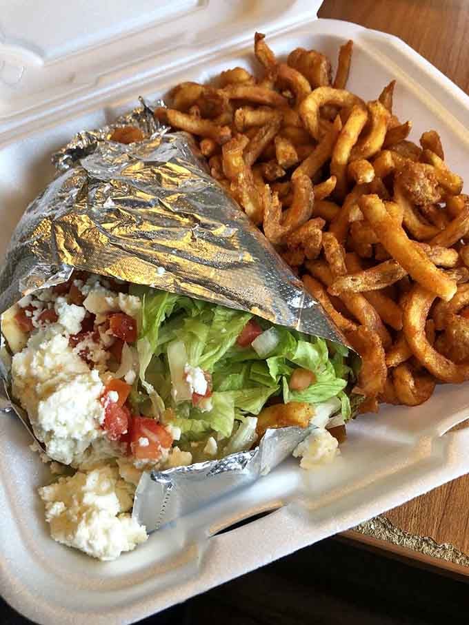 This falafel gyro with crispy fries shows Tommy's doesn't just do breakfast, they do everything with serious skill.