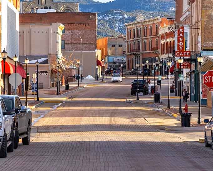 Historic architecture meets mountain backdrop, creating postcard views that don't cost extra to enjoy every single day.