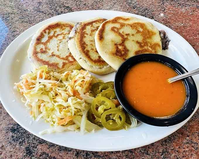 Pupusas with coleslaw and jalapeños prove this diner knows how to surprise you beyond traditional American breakfast fare.