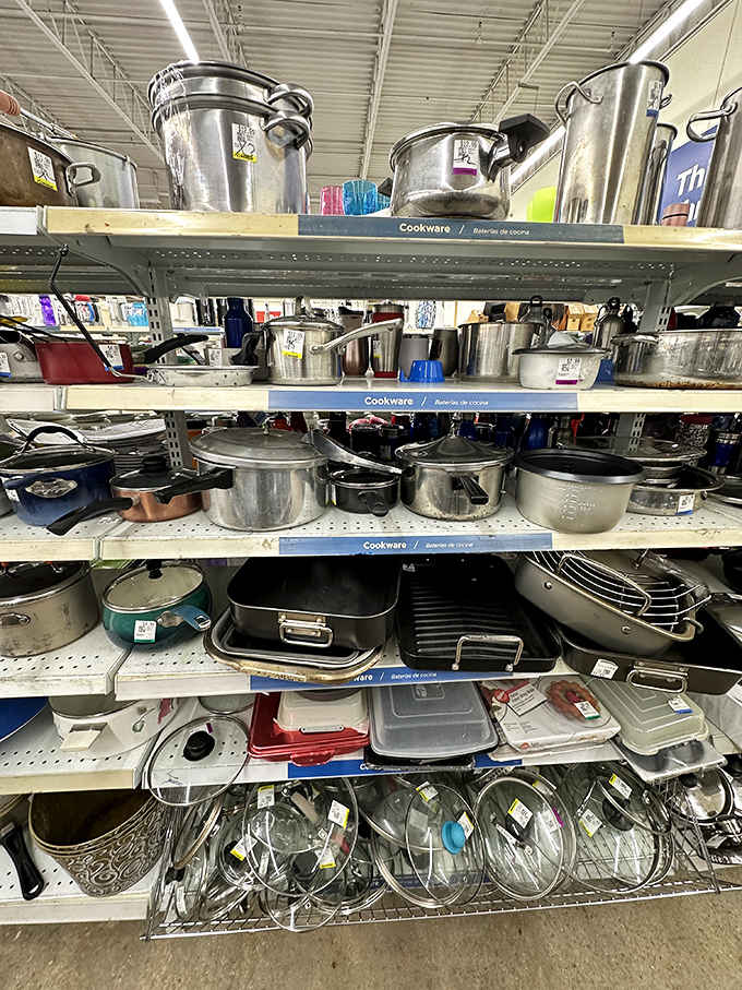 Pots and pans stacked like a metallic mountain range, ready to equip your kitchen for pennies on the dollar.