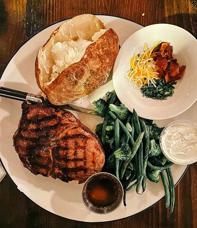 A perfectly seared ribeye with fresh asparagus is the kind of plate that makes carnivores weep with joy.
