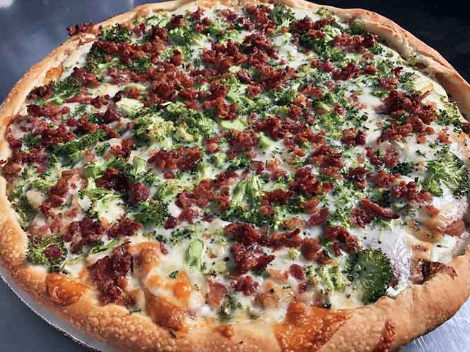 Red potato pizza with bacon demonstrates why this place won awards for thinking outside the traditional pizza box.