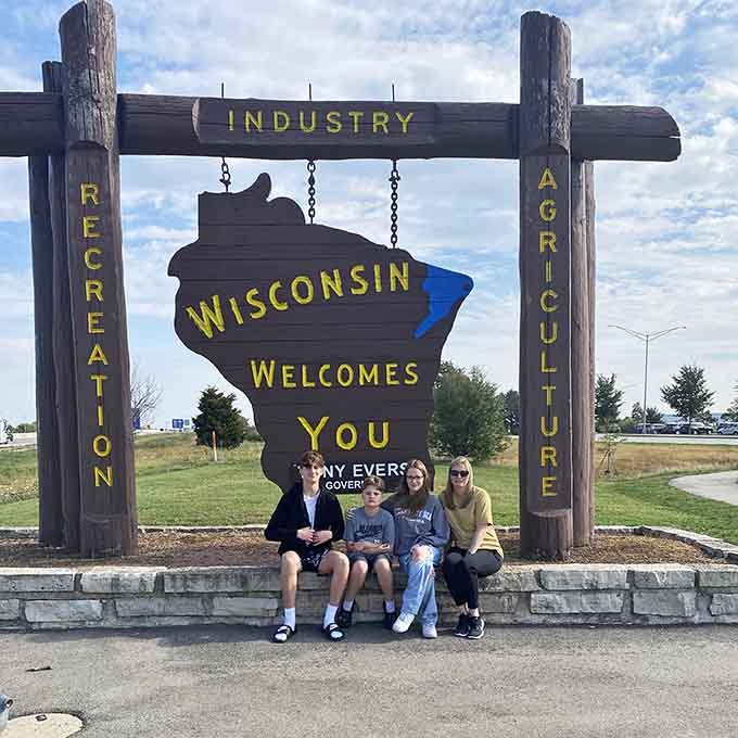 Four generations of Wisconsin pride, all gathered at the spot where every great homecoming story begins.