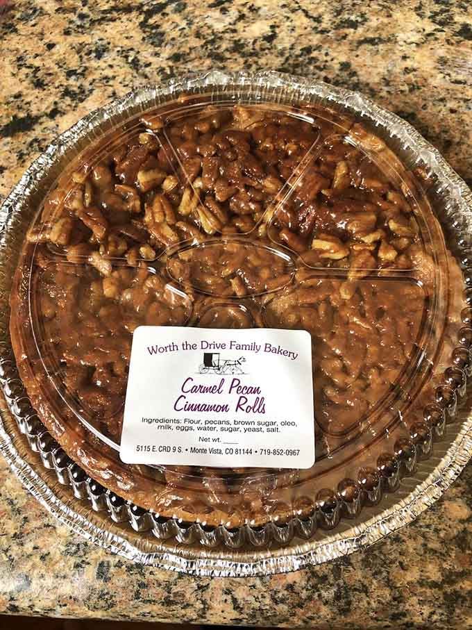 Caramel pecan cinnamon rolls that look like they belong in a museum, except museums don't smell this incredible.