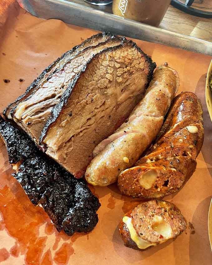 When brisket and sausage team up, it's like the Avengers of smoked meat assembled on your plate.