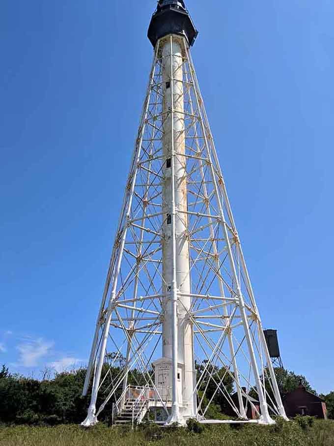 This skeletal tower reaches skyward like the Eiffel Tower's practical American cousin who chose function over fancy French curves.