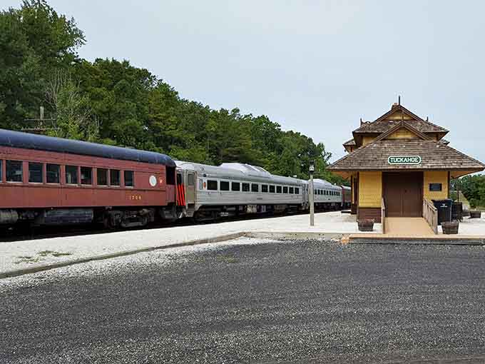 That charming yellow station building welcomes travelers like a scene from "The Music Man" brought to life.