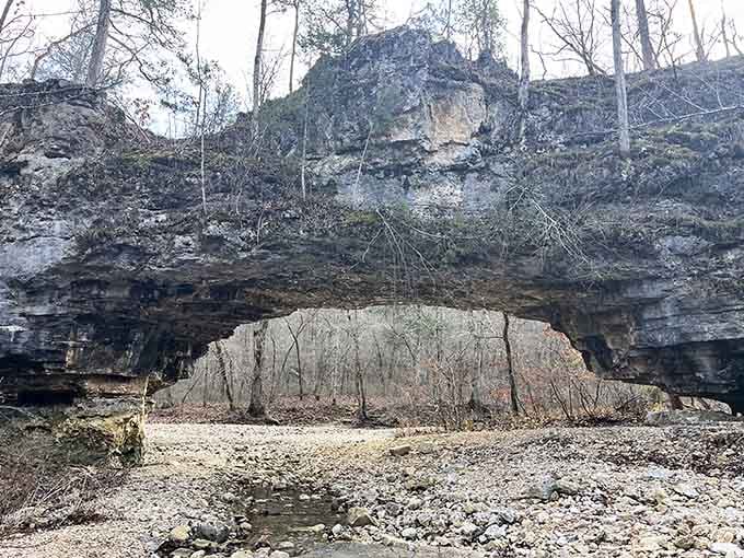 This massive natural arch stands like a stone rainbow, carved by patient water over thousands of quiet years.