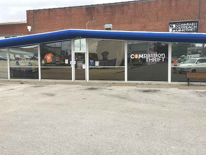 The blue awning shelters a community hub where shopping becomes an act of kindness toward neighbors in need.