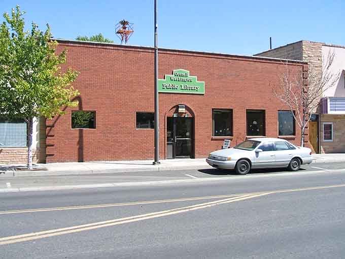 Small-town libraries like this brick beauty prove that community gathering spots don't need fancy architecture to matter.