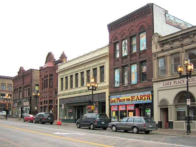 Victorian-era buildings wear their age beautifully, standing shoulder to shoulder like distinguished guests at a garden party.