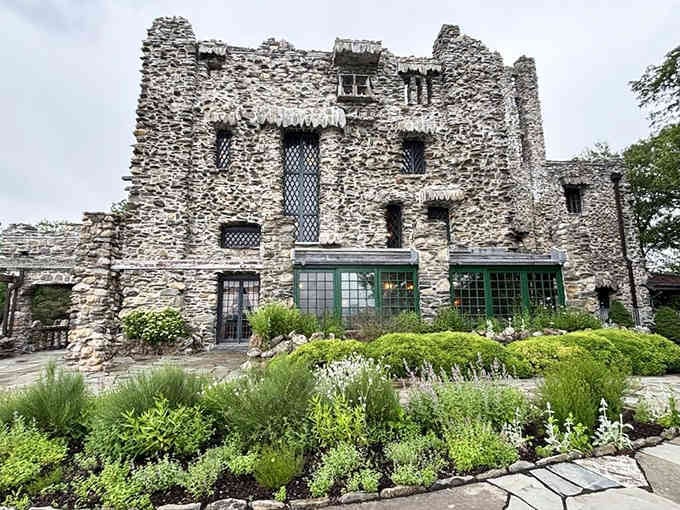 Medieval meets Connecticut in this stone fortress where every carefully placed rock whispers tales of theatrical grandeur.