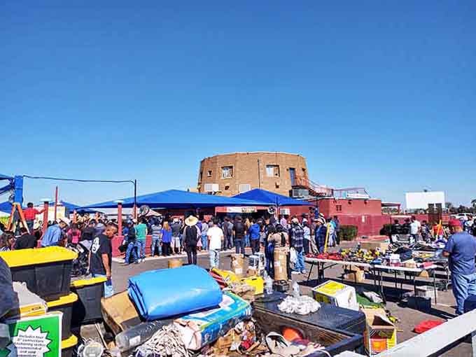Blue canopies dot the horizon like a treasure hunter's paradise where bargains outnumber clouds in the sky.
