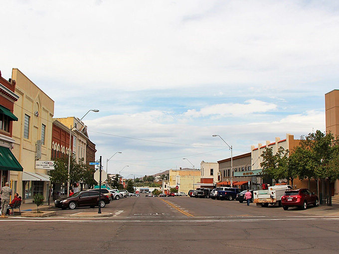 Mountains rise beyond the main street where local shops invite leisurely browsing and friendly conversation.