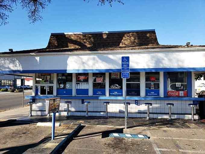 Blue and white stripes give this classic drive-in the timeless appeal of an old-fashioned American summer day.