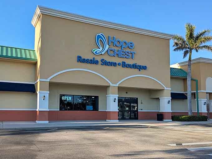 The cheerful yellow storefront radiates optimism, promising treasures that support a meaningful community cause.