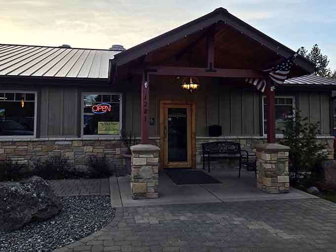 Stone pillars and rustic charm set the stage for a steakhouse experience worth the drive.