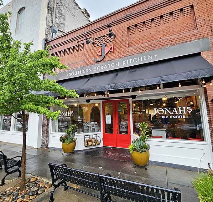Those bright red doors welcome you into a world where fish and grits become poetry on a plate.