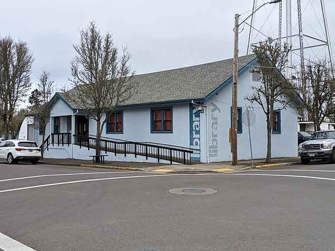 The crisp white building with its decorative trim could be plucked from a Scandinavian postcard, right down to the details.