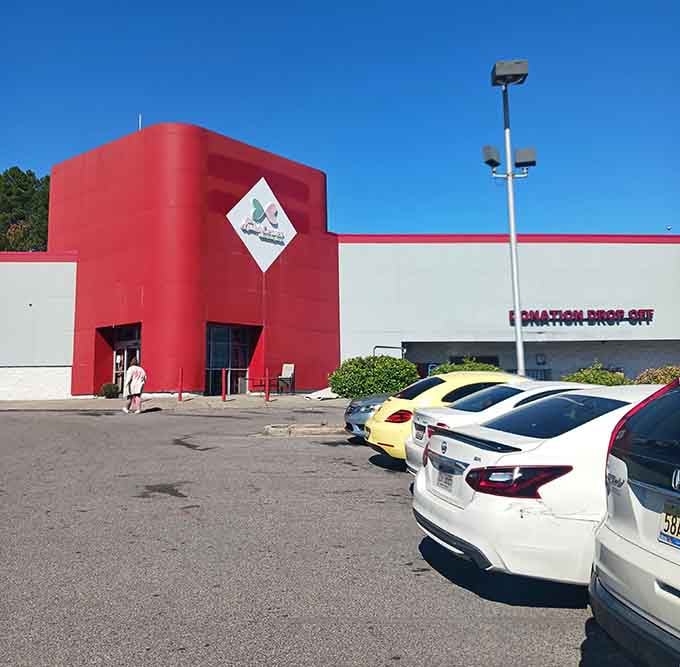 That striking red tower catches your eye from the highway, promising deals that'll make you pump the brakes.