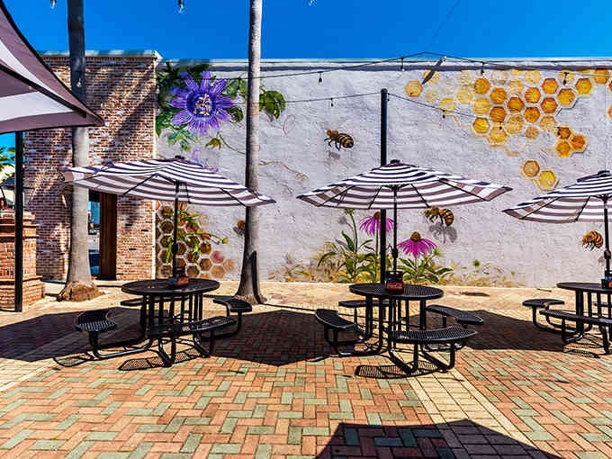 Street art featuring bees and honeycomb turns this patio into an Instagram-worthy outdoor gallery with great food.