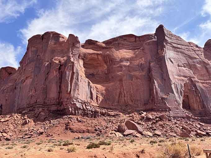This massive butte towers over the desert floor, showing the raw power of nature's ability to carve incredible monuments from stone.