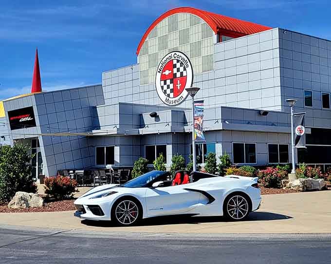 That sleek white Corvette looks ready to zoom right off the pavement and into your wildest American dream fantasies.