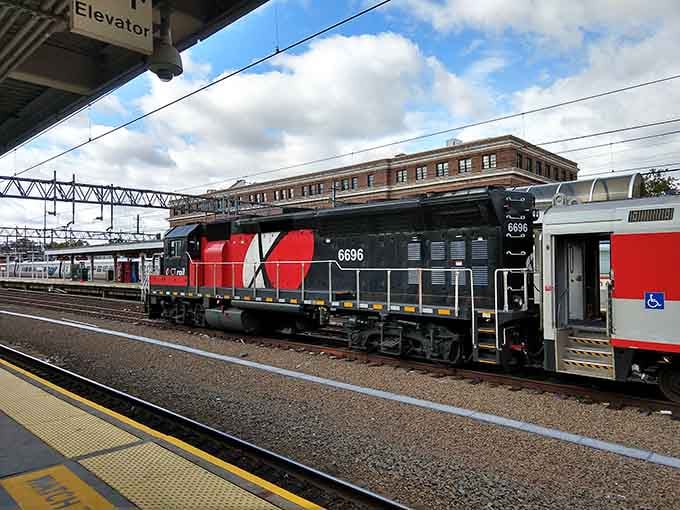 Modern meets vintage as locomotives share the platform, proving trains never really go out of style here.