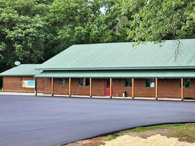 Surrounded by towering trees, this northwoods retreat offers both RV parking and ribeyes under one roof.