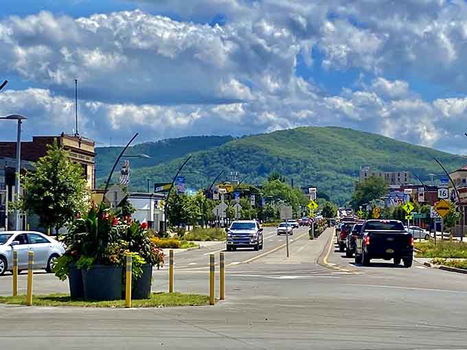 Mountains frame the main street in the distance, creating a postcard-perfect backdrop that money simply cannot buy anywhere else.